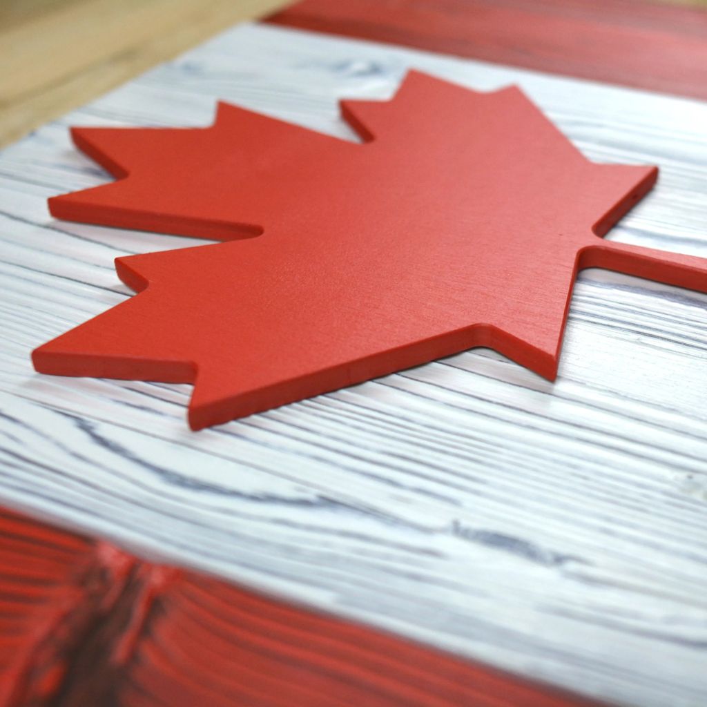 Canadian Flag in Wood: Deeply Burned, Hand-Brushed Art
